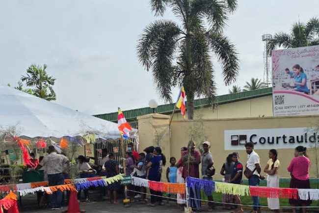 Celebrating Vesak Dansala | Courtaulds Clothing Lanka (Pvt) Ltd
